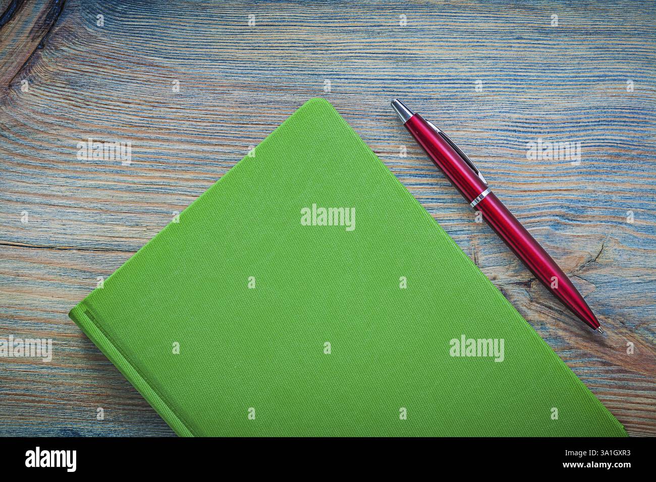 Notepad ball-point pen on wooden board top view education concept Stock ...