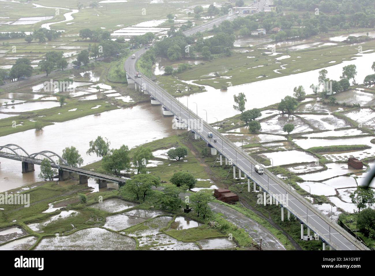 An aerial view of farming land immersed in water flood rocked in Raigad ...