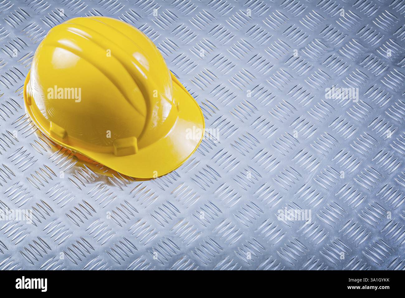 Hard hat on corrugated metal sheet construction concept Stock Photo - Alamy