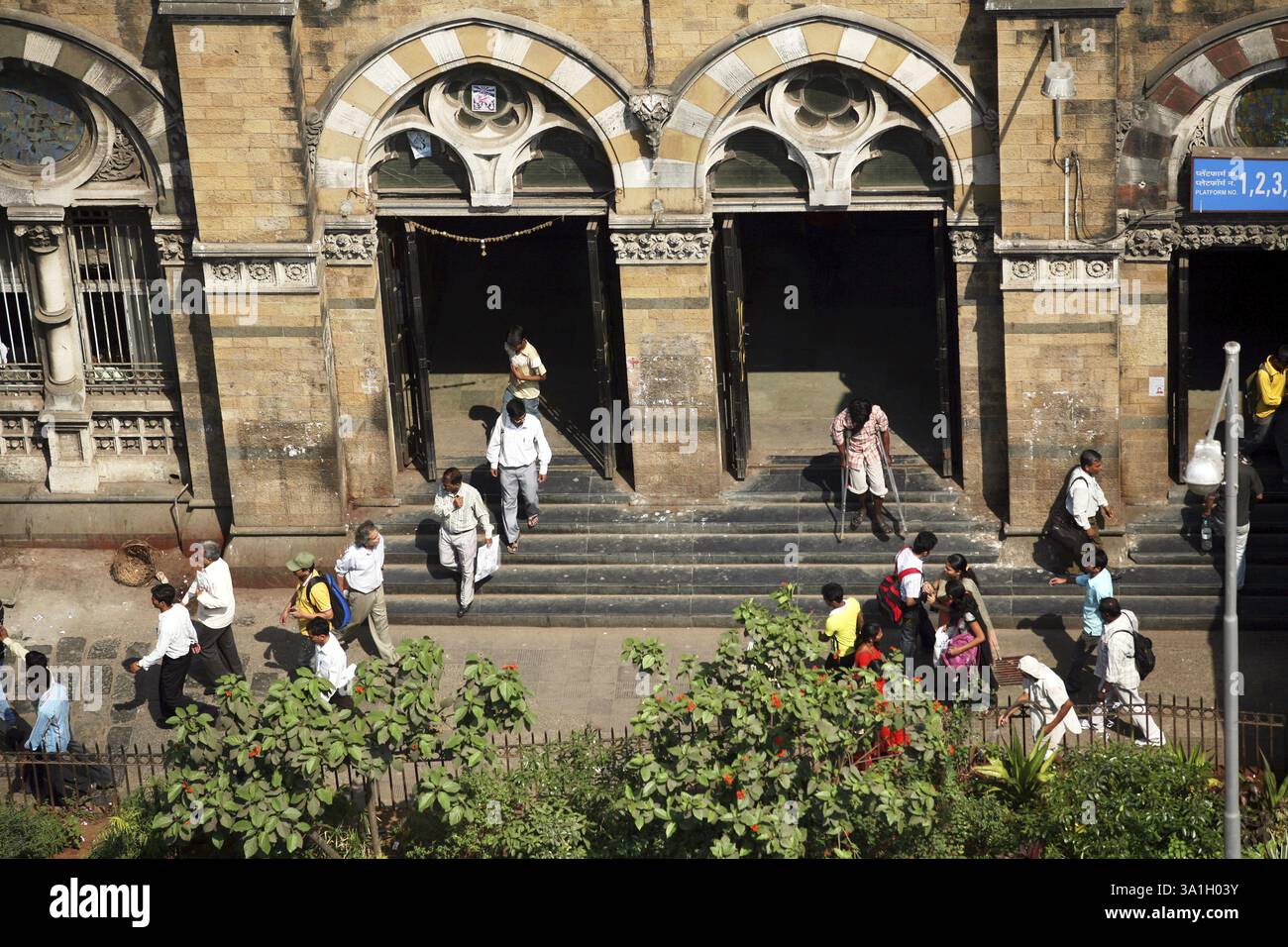 Pedestrian walking outside the Chhatrapati Shivaji Terminus (CST ...