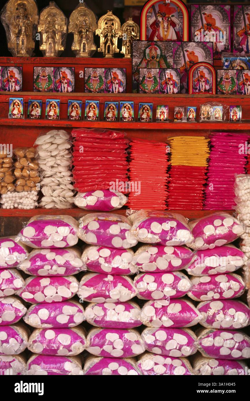 The gulal or pink powder packets and sweets packets at Jotiba temple in ...