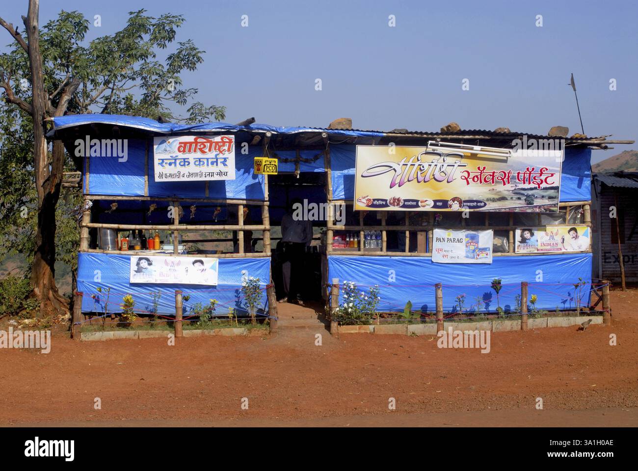 Typical stall of snacks at the side of Highways, Vashishti river view ...