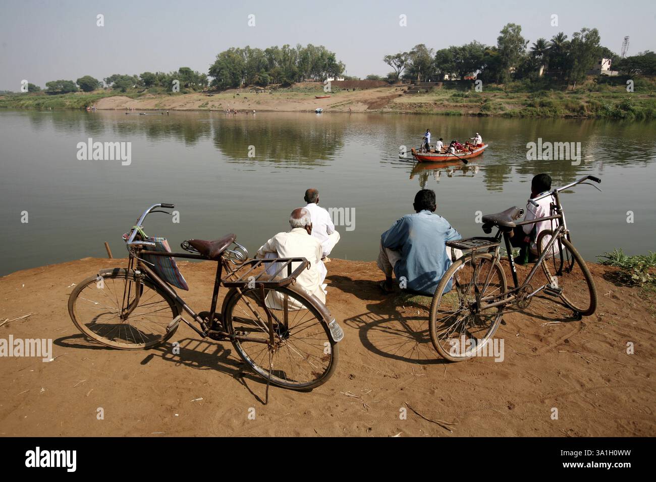 Villagers of the Haripur village waiting for the boat to cross river ...