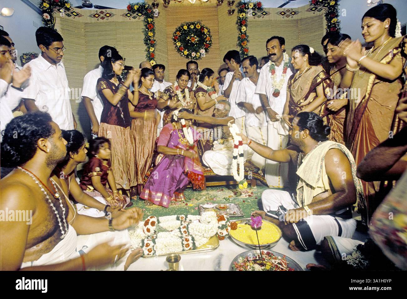 Sathabhishekam (80th birth day), the chettiar tying the mangalasutra ...