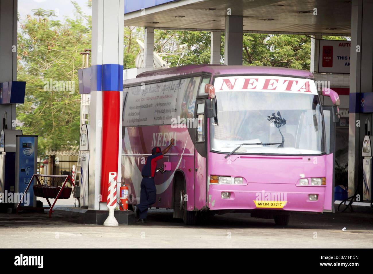 Tourist buses refilling at the petrol pump on Mumbai-Pune expressway ...