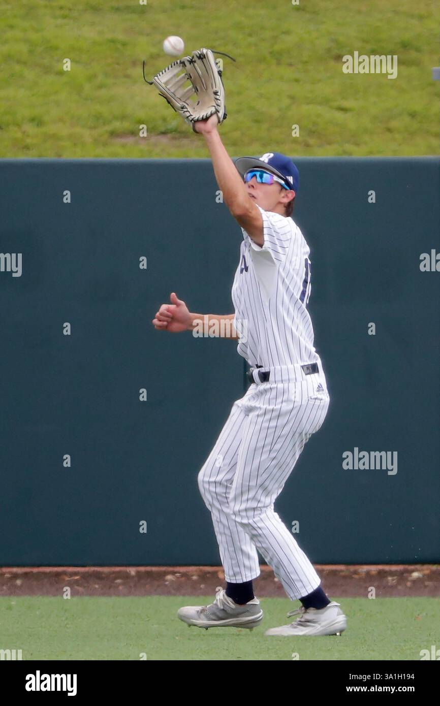 Rice center fielder Colin Robson makes a catch at the wall for the out ...