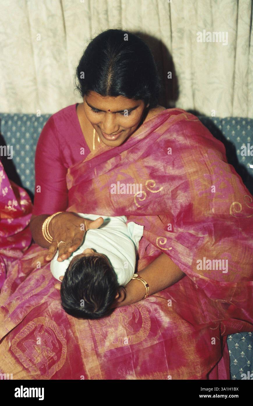 South Asian Indian woman with her child, wife of famous artist N. T ...