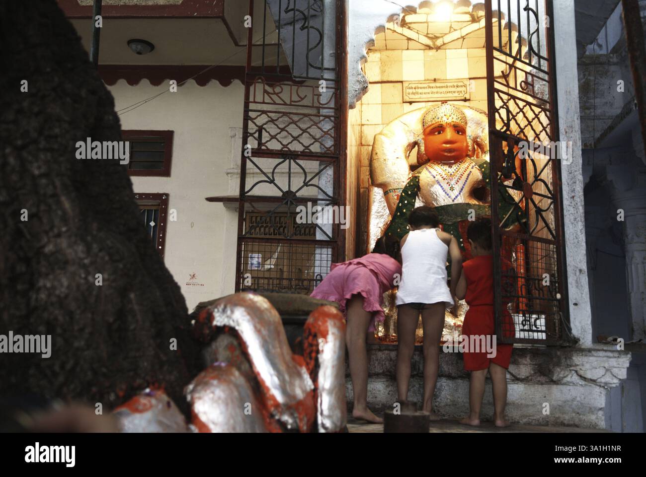 Children praying of Hanuman god in temple, Dilwara, Rajasmand District ...