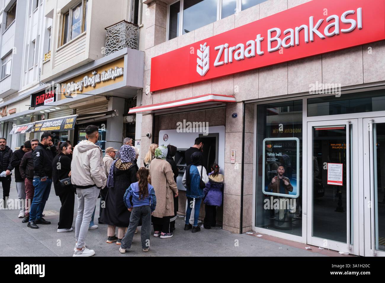 Gaziantep, Turkey, Turkiye. Customers Lined Up at an ATM Machine Stock ...