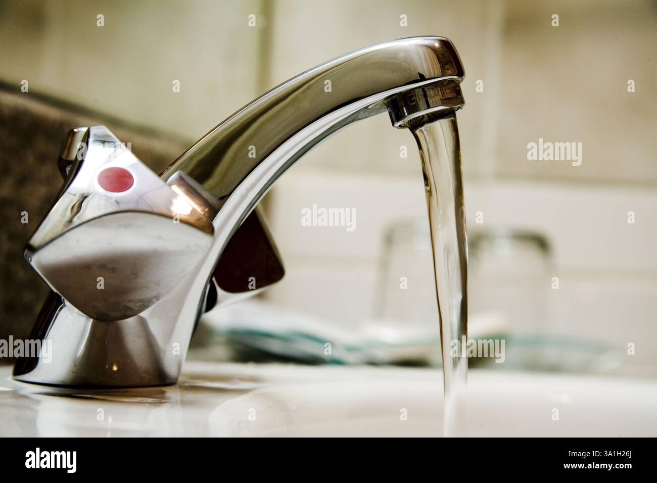 Water running from wash basin tap, Interior of the hotel room, Abu ...
