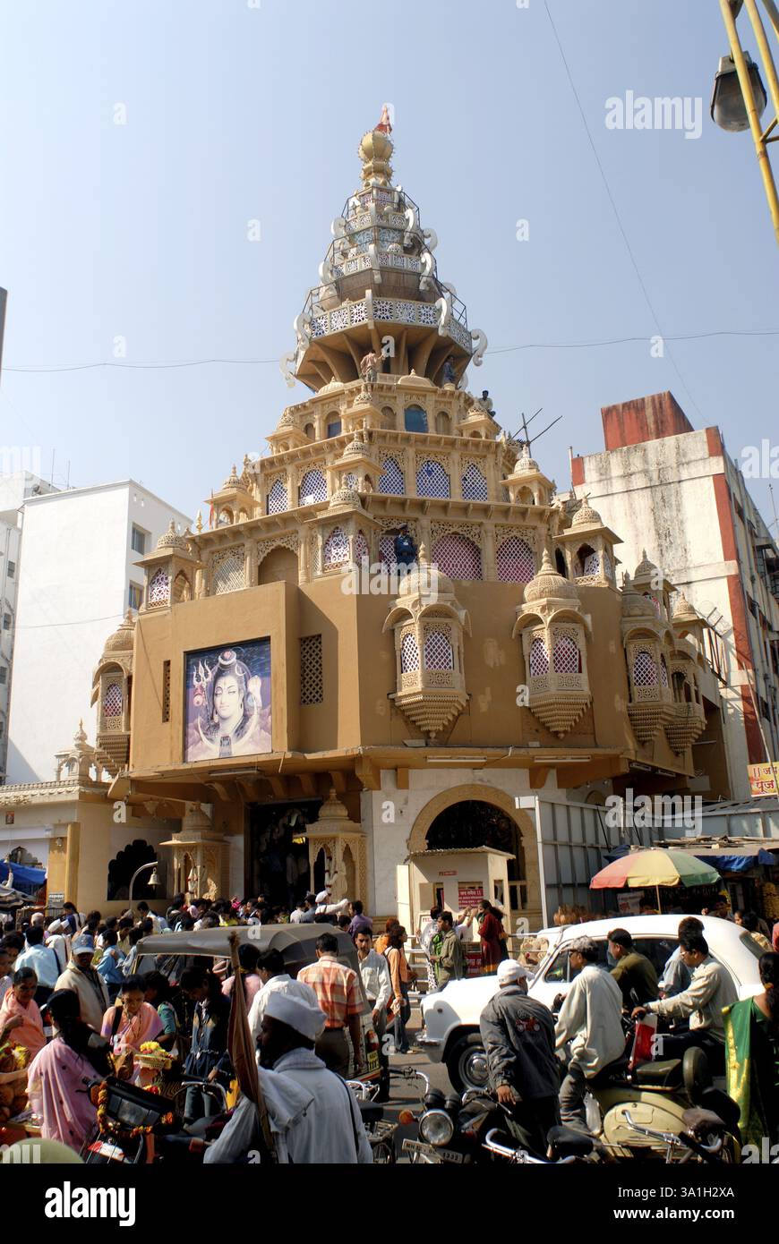 Temple of Dagdu Seth Halwais Ganesh and traffic on that road in Pune ...