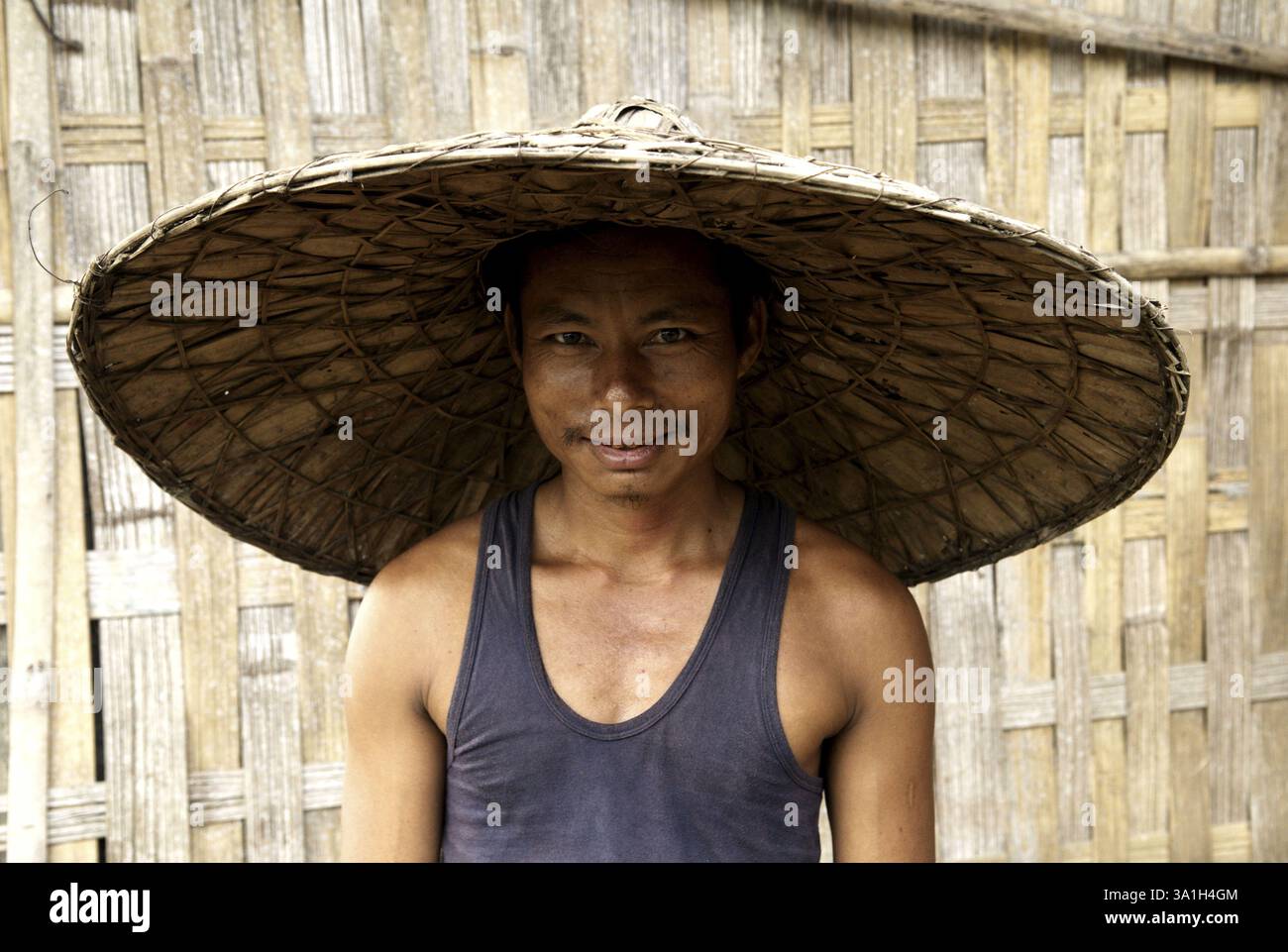 Man wearing traditional hat, Chakma tribal, Arunachal Pradesh, India ...