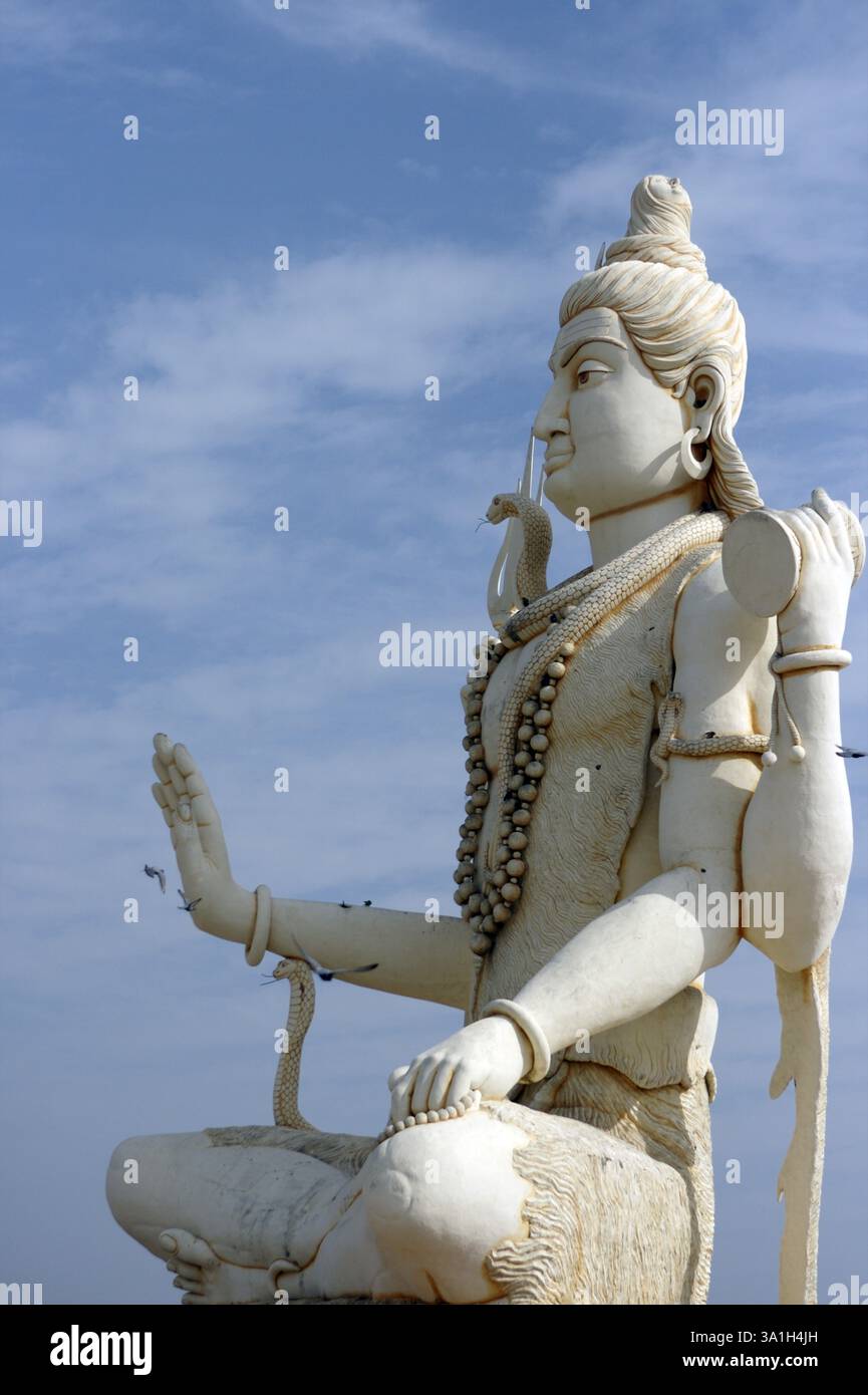 White statue of lord shiva at nageshwar temple at dwarka district ...