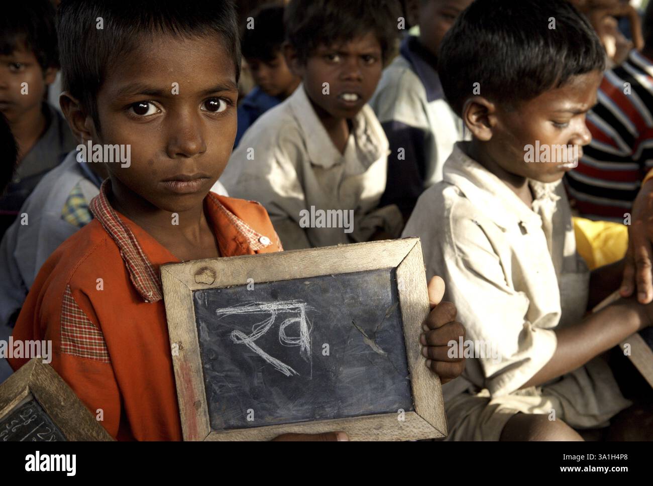 Rural boy showing slate, Rajouli, Nawada, Bihar, India, Asia Stock ...