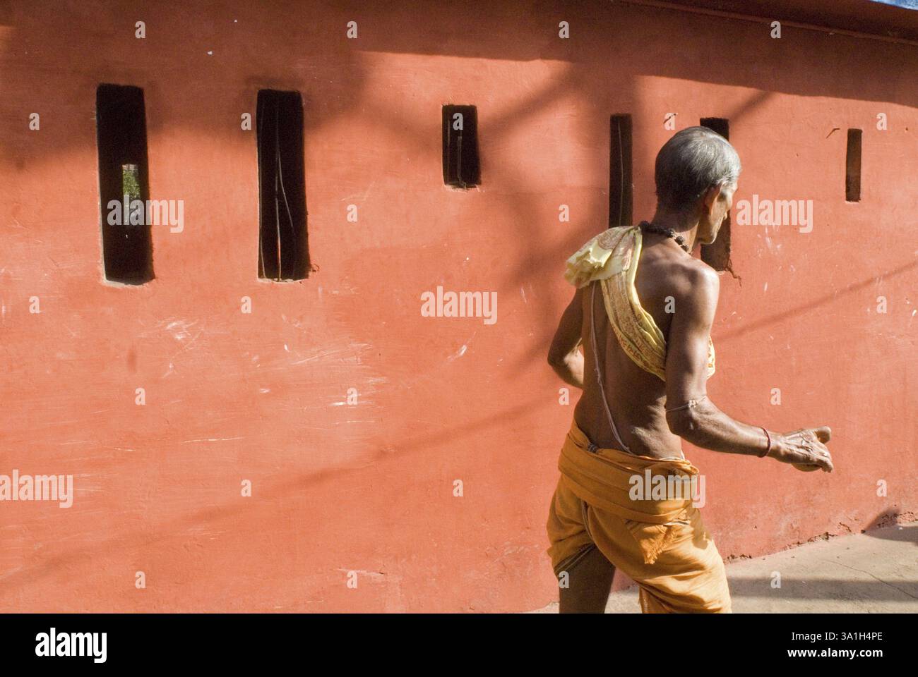Priest at 11th century Brahmeshwar temple dedicated to lord Shiva ...
