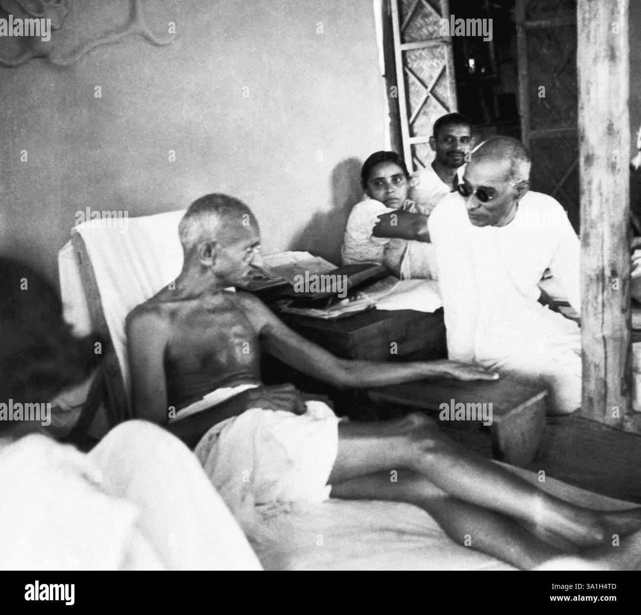 Mahatma Gandhi talking with Chakravarti Rajagopalachari in his hut at ...