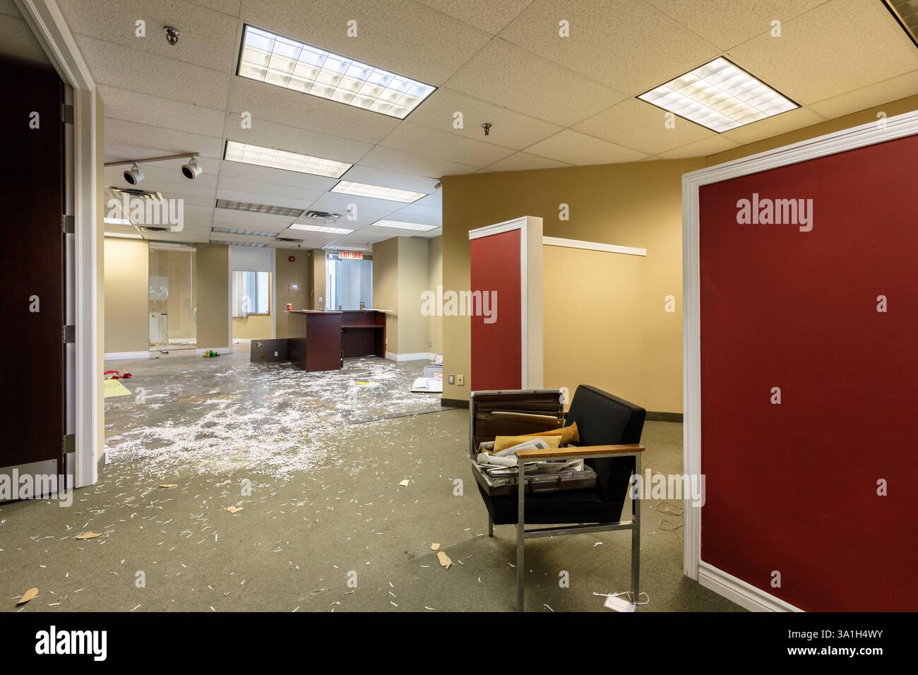 A messy office in an abandoned office building. This building has been ...