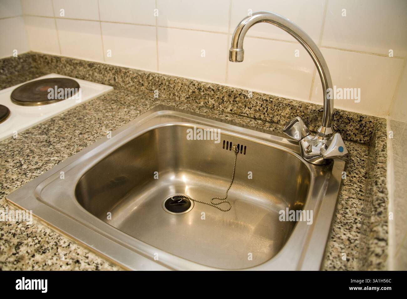 Stainless steel kitchen sink, Interior of the hotel room, Abu, Dhabi ...