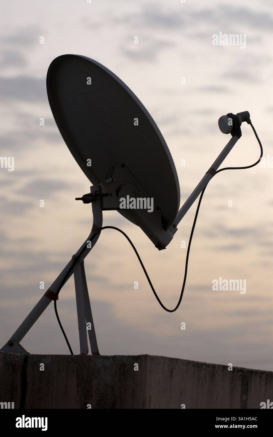 Dish Antenna on terrace of village house, entertainment through ...