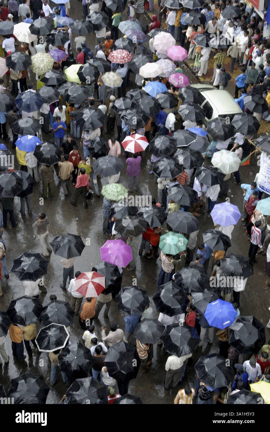 Aerial view of people using colorful umbrellas near Dadar, Mumbai ...