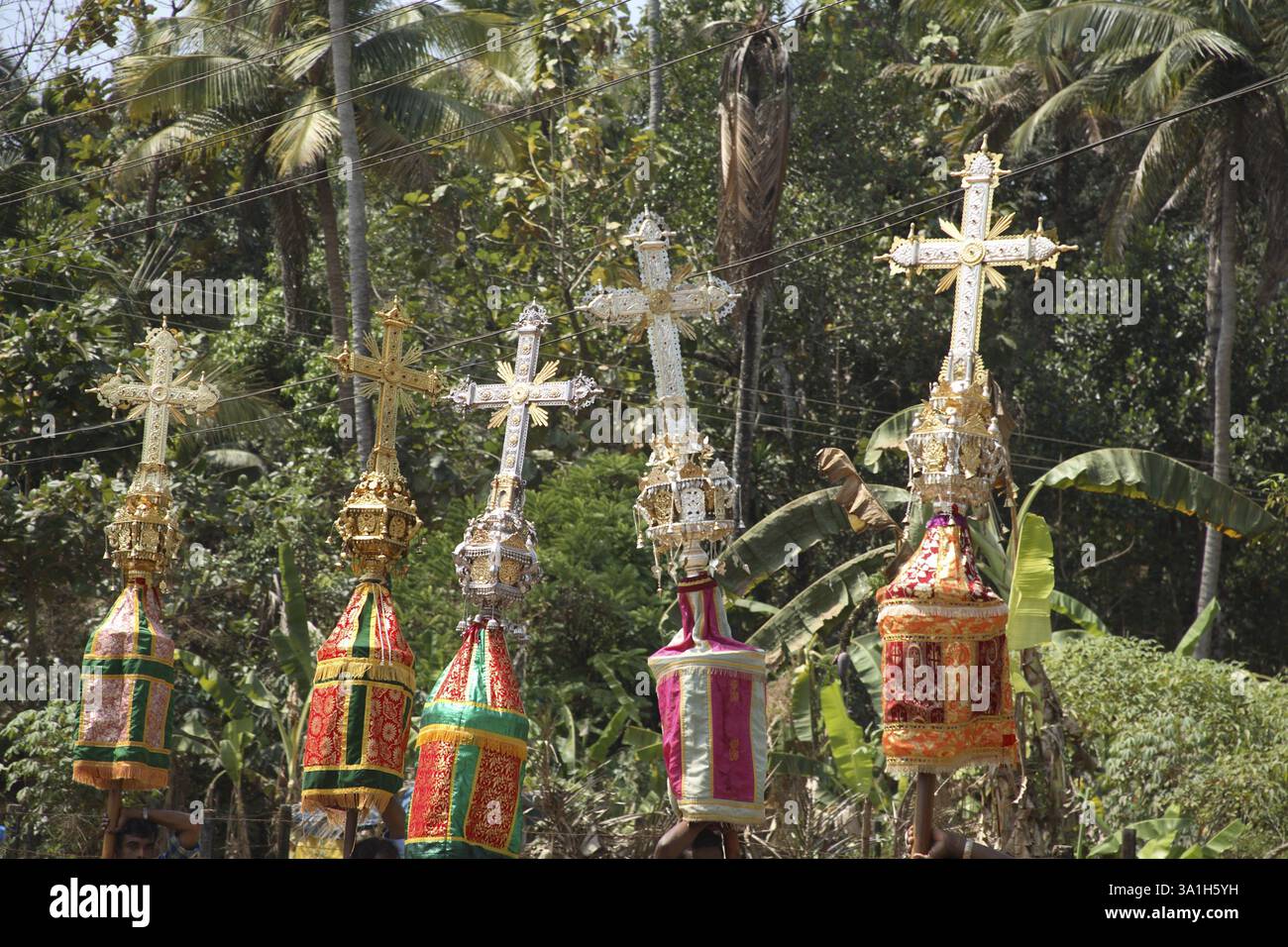 Syrian Christian in procession decorative colorful crosses near ...