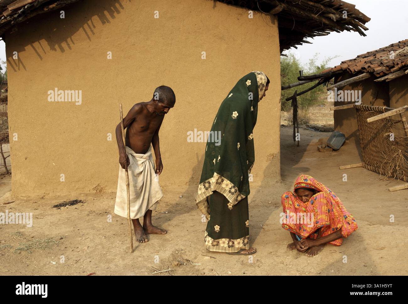People standing outside hut, Garwa and Latehar, Jharkhand, India, Asia ...