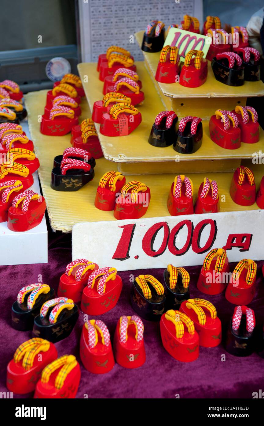 Japanese souvenirs or trinkets in the shape of miniature maiko okobo ...