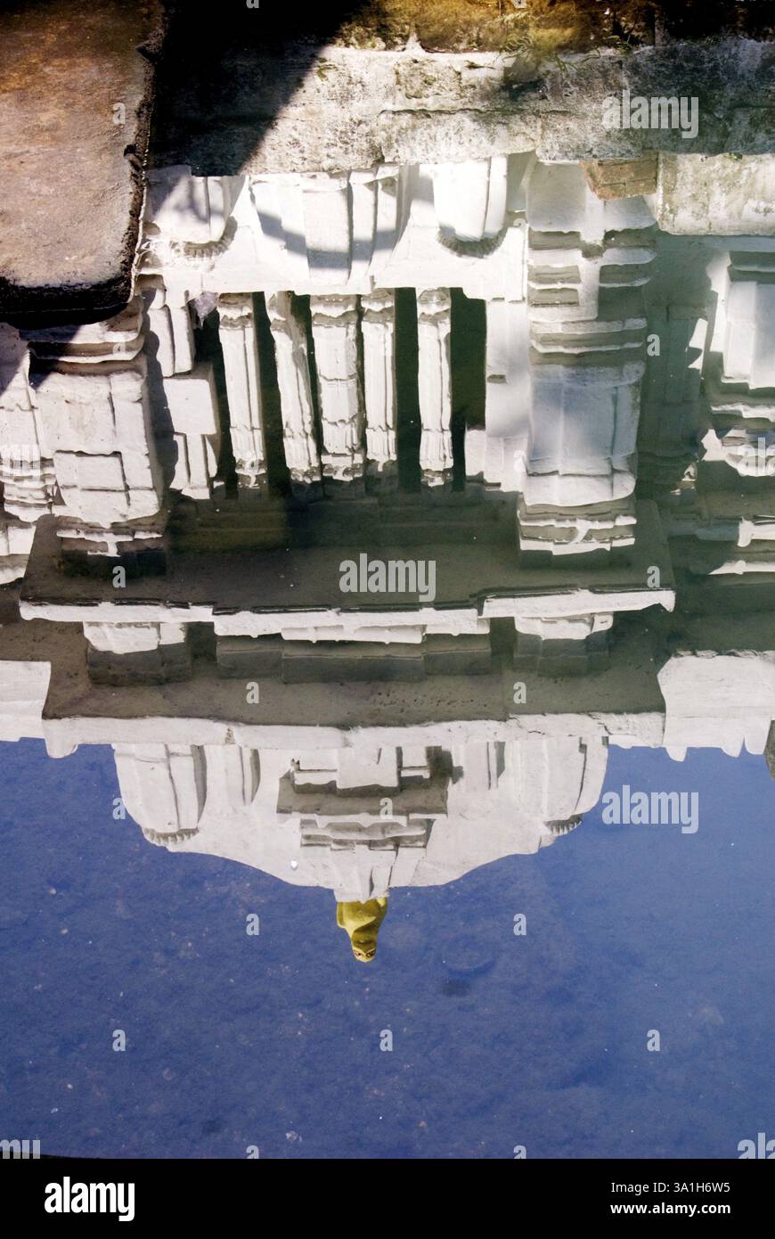 Reflection of 11th century Brahmeshwar temple in ritual pond dedicated ...