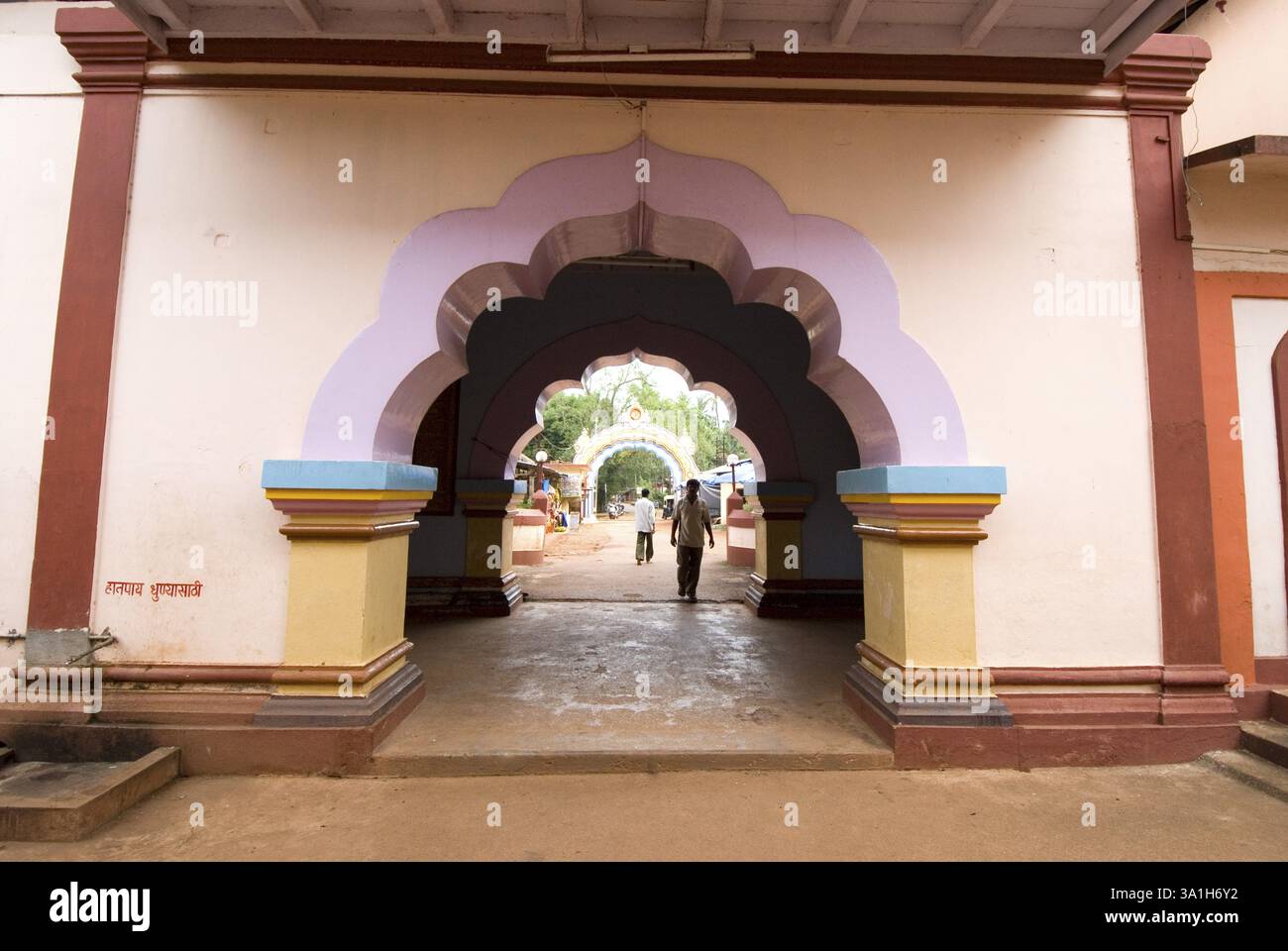 Colourful gate of temple vetoba king of ghost at village Aravali ...