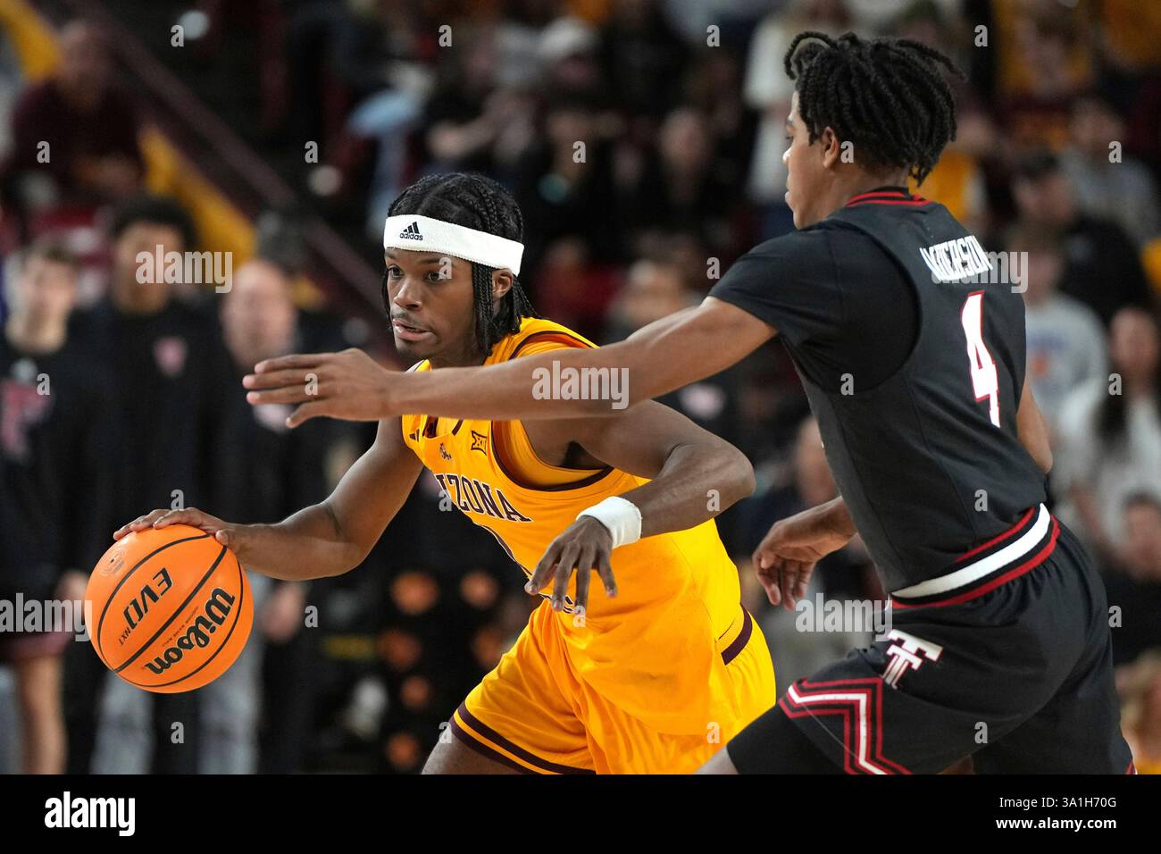 Arizona State guard Alston Mason, left, drives against Texas Tech guard ...