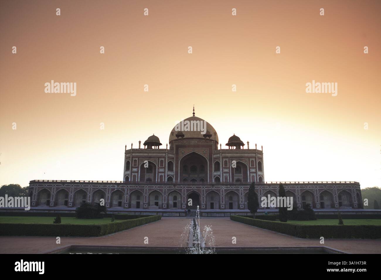 Sunrise at Humayun's tomb built in 1570 made from red sandstone and ...