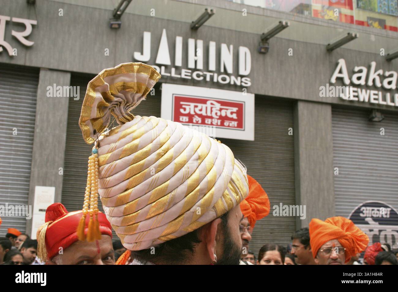 Headgear like Shivaji made of cotton cloth and designed with golden ...