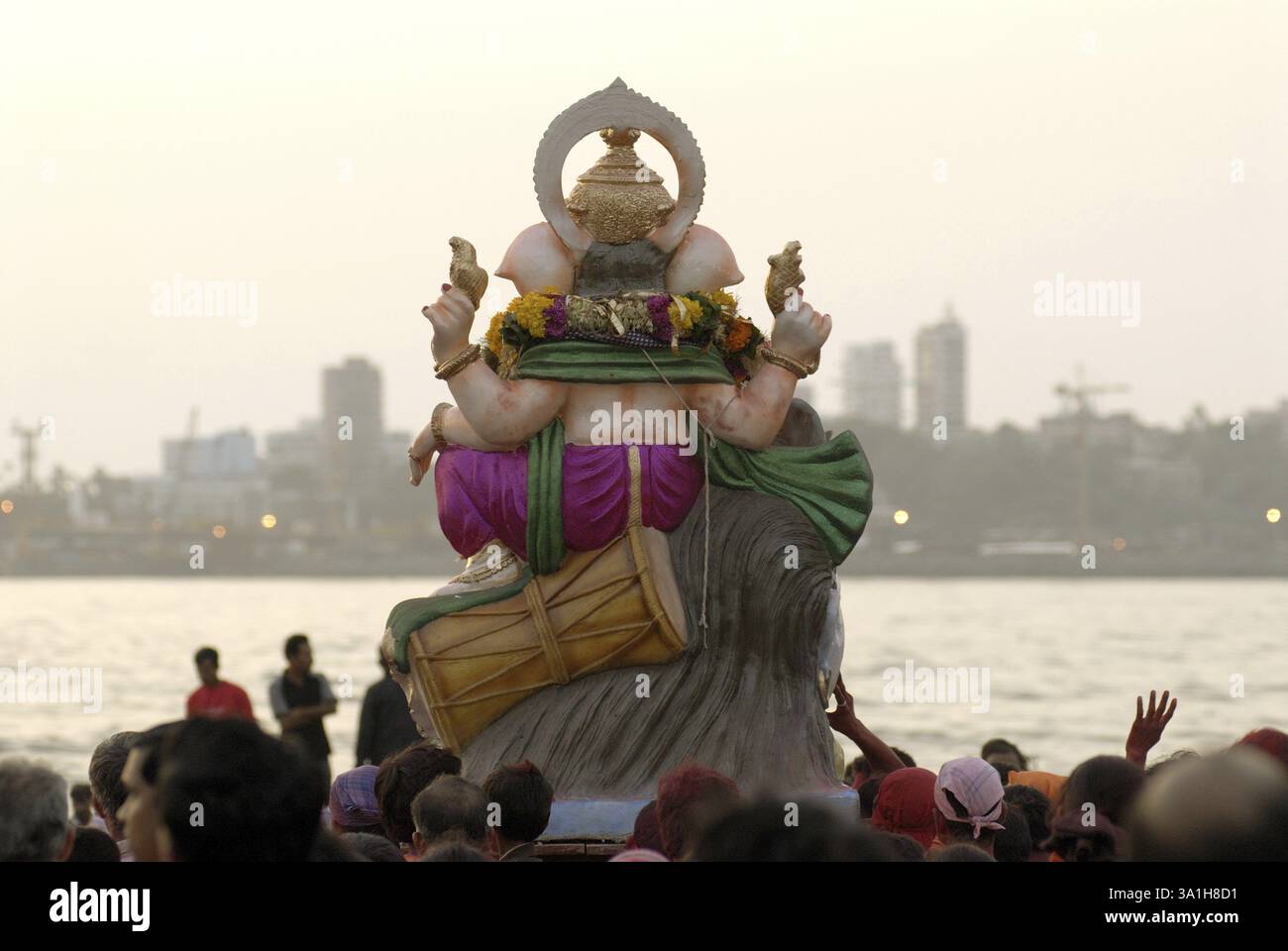 Back pose of Idol of lord Ganesh ganpati during immersion at Mahim ...