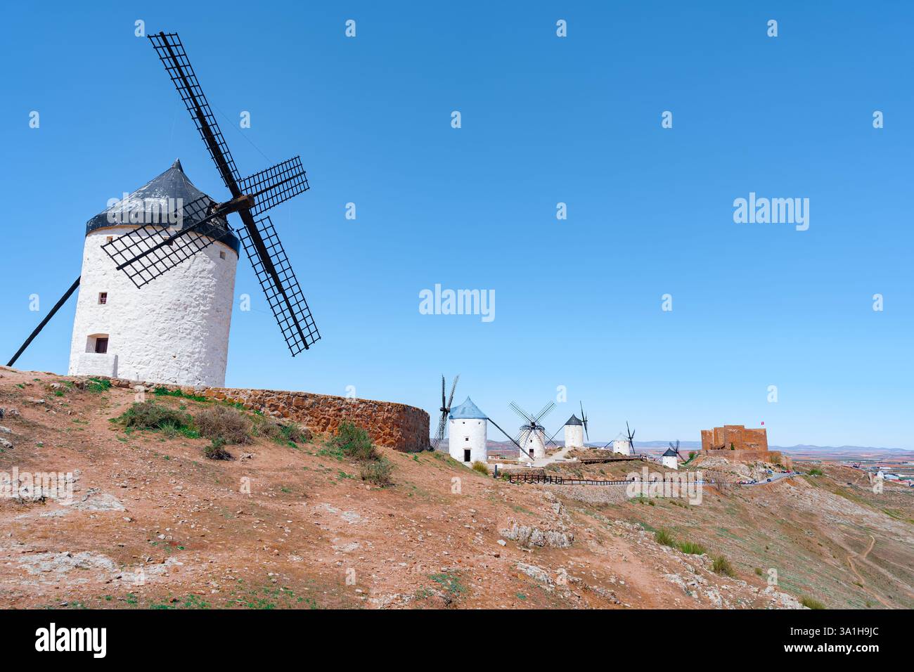 Medieval windmills on a sunny day with blue sky Stock Photo - Alamy