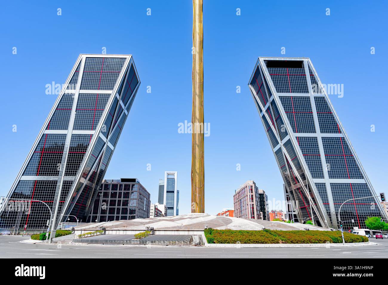 Tall buildings in a modern city like Madrid, Spain, on a sunny day with ...