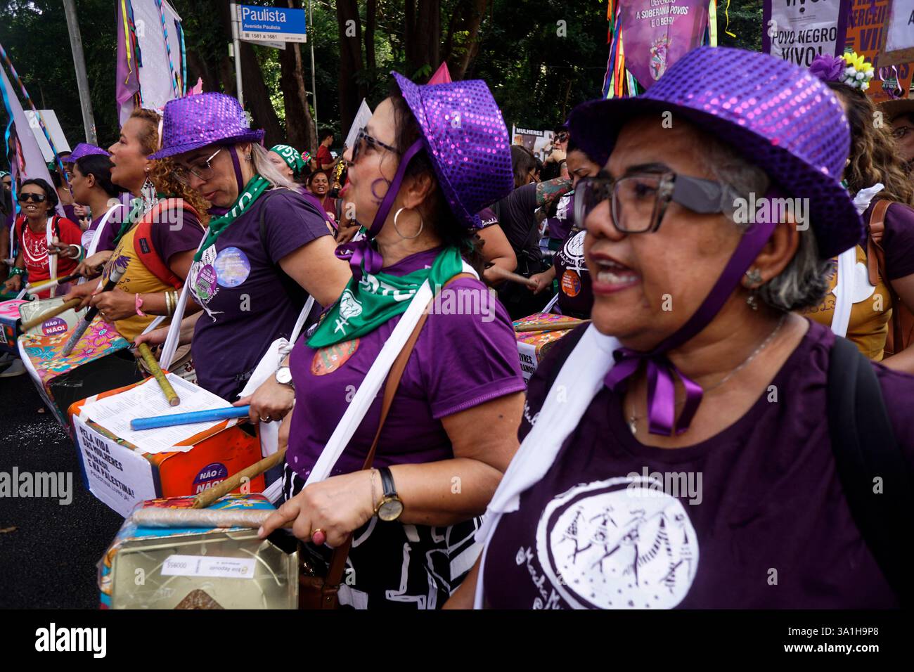 Women take part in a march to mark International Women's Day in Sao Paulo, Brazil March 8, 2025 ...