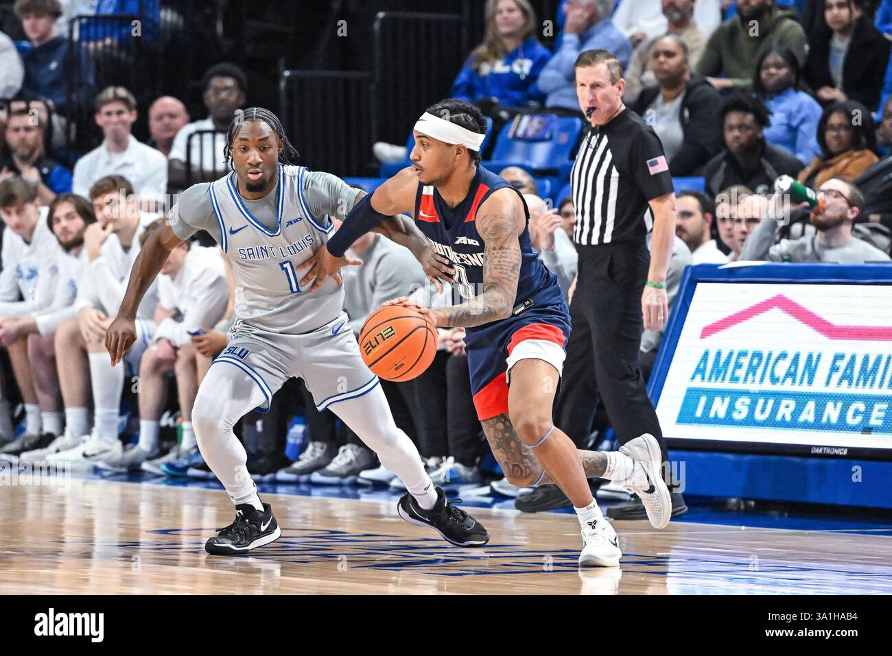 MARCH 08, 2025: Duquesne Dukes guard Tre Dinkins (0) tries to dribble ...