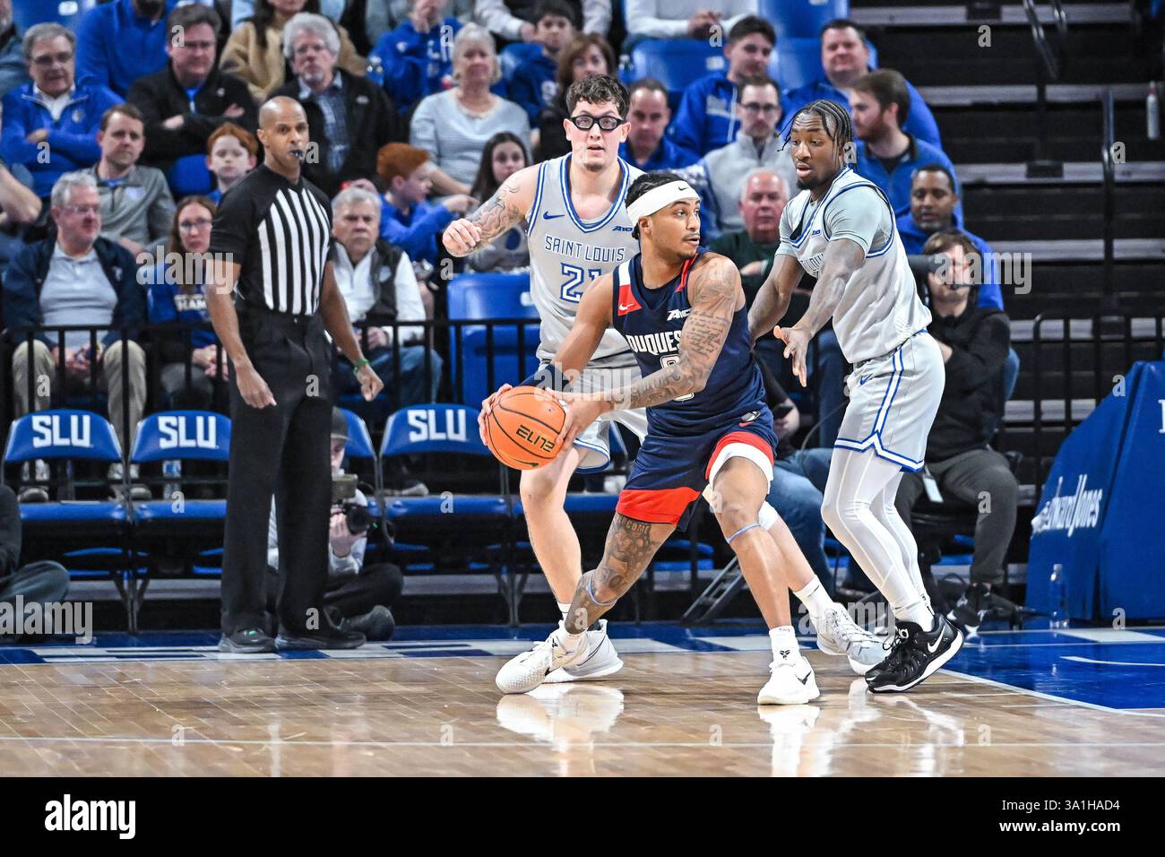 MARCH 08, 2025: Duquesne Dukes guard Tre Dinkins (0) looks for a play ...