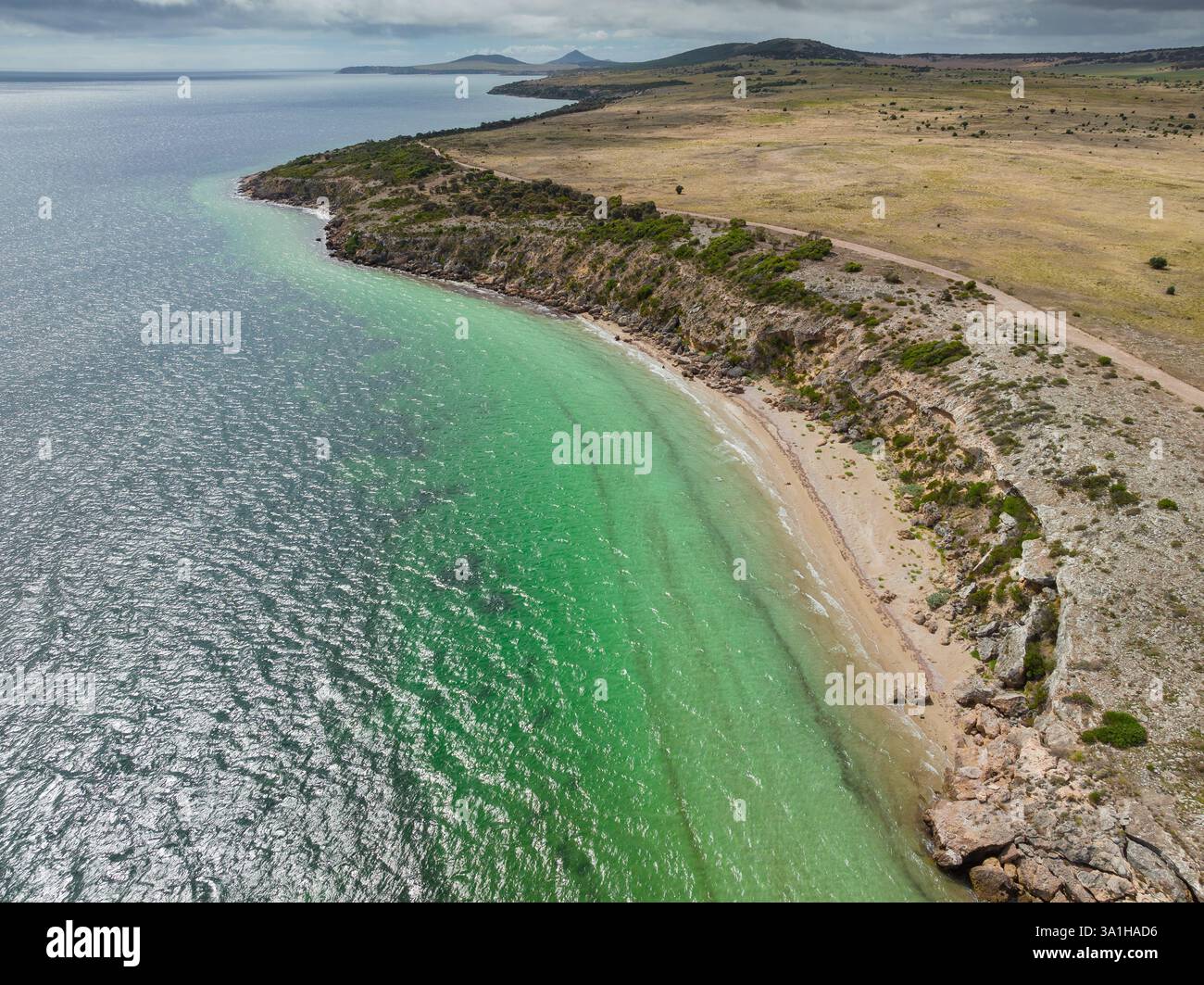 Aerial view of an unspoiled natural coastline stretching off into the ...