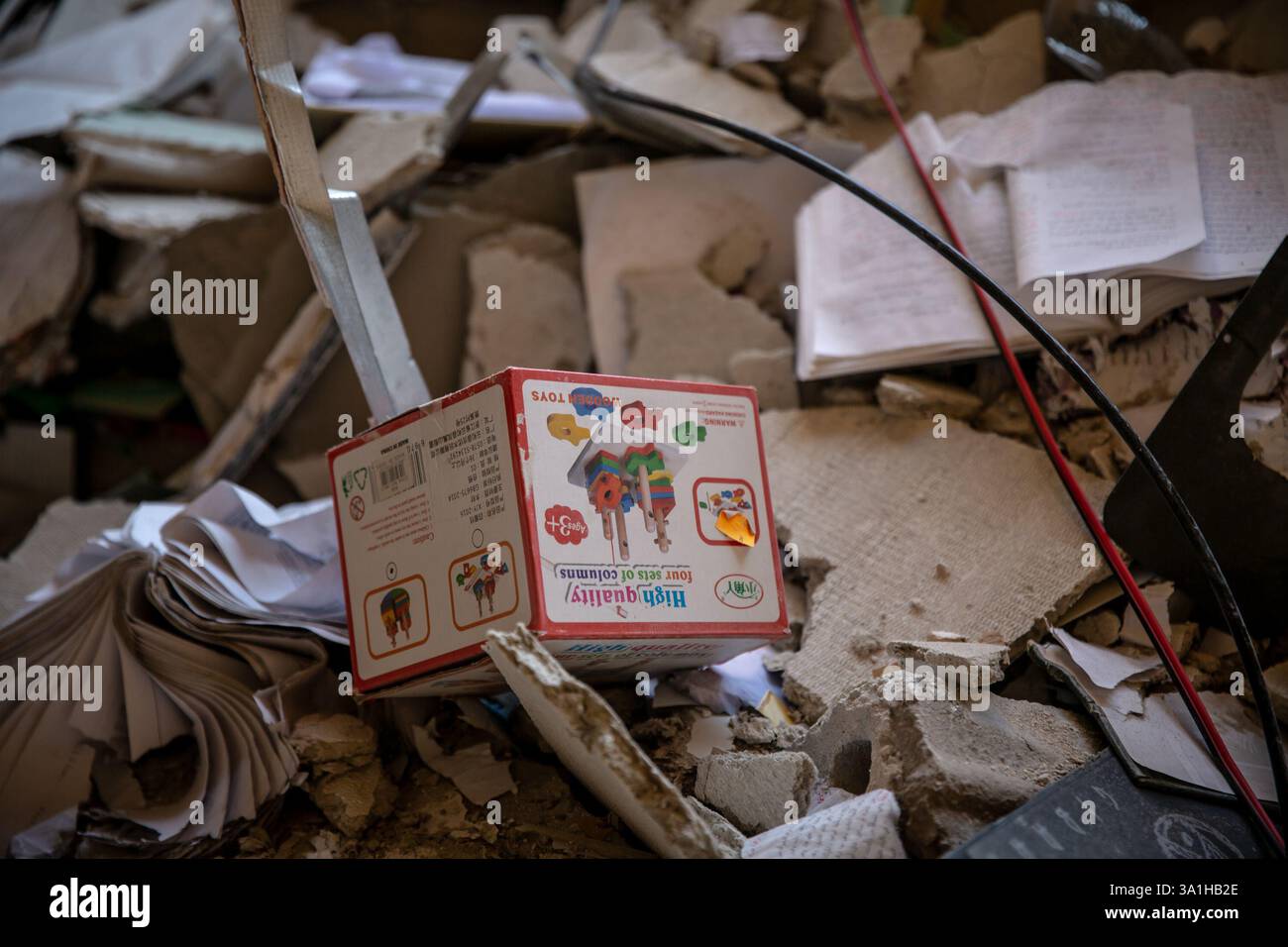 The box of a child's toy seen inside a partially destroyed municipality ...