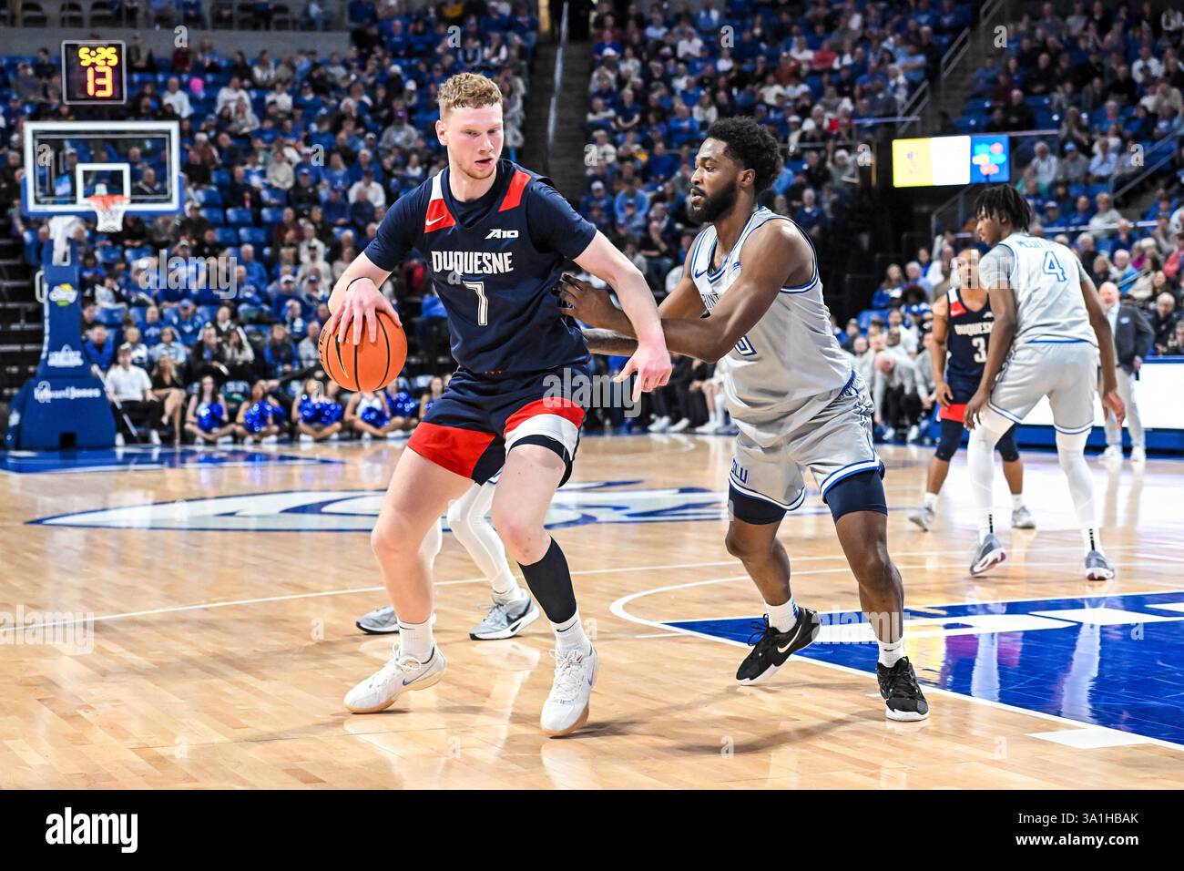 MARCH 08, 2025: Duquesne Dukes forward Jakub Necas (7) works against ...