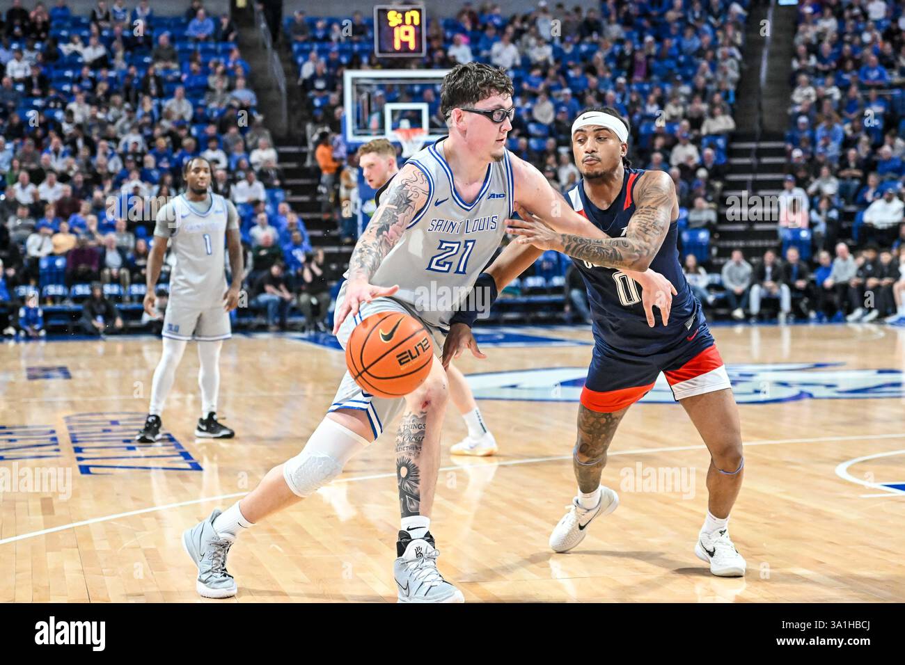 MARCH 08, 2025: Saint Louis Billikens center Robbie Avila (21) dribbles ...