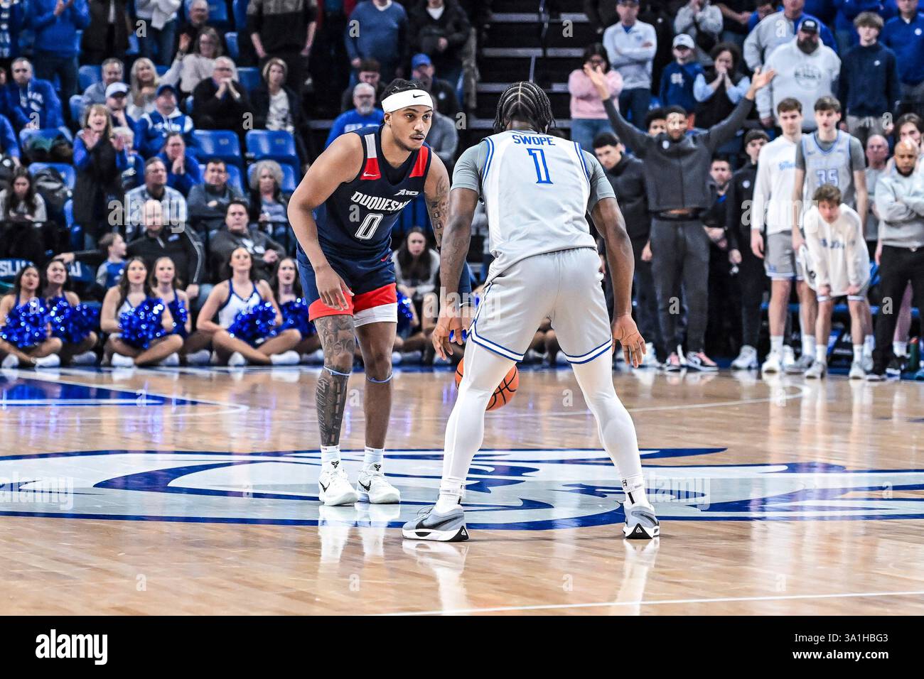 MARCH 08, 2025: Duquesne Dukes guard Tre Dinkins (0) goes against the ...