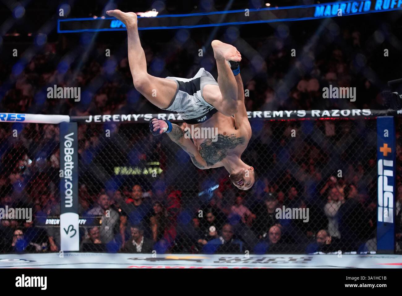 Mauricio Ruffy celebrates after defeating King Green during a UFC 313 ...