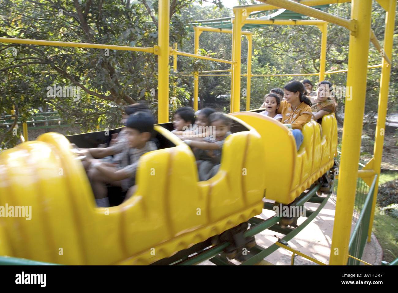People enjoying roller coaster ride in Amusement park Tikuji ni wadi ...