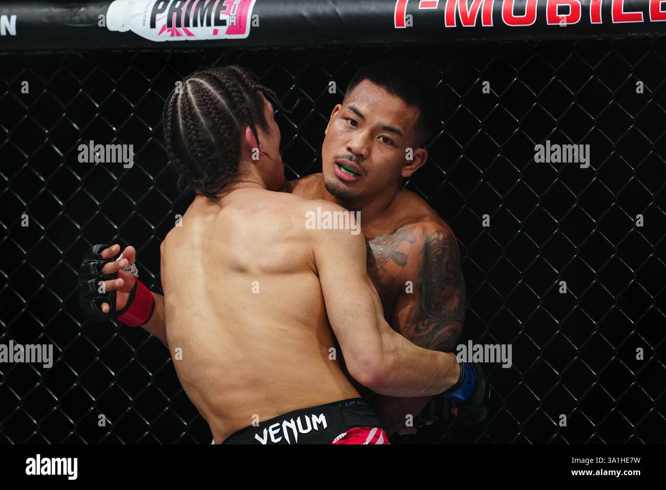 LAS VEGAS, NV - MARCH 8:Joshua Van and Rei Tsuruya meet in the octagon ...