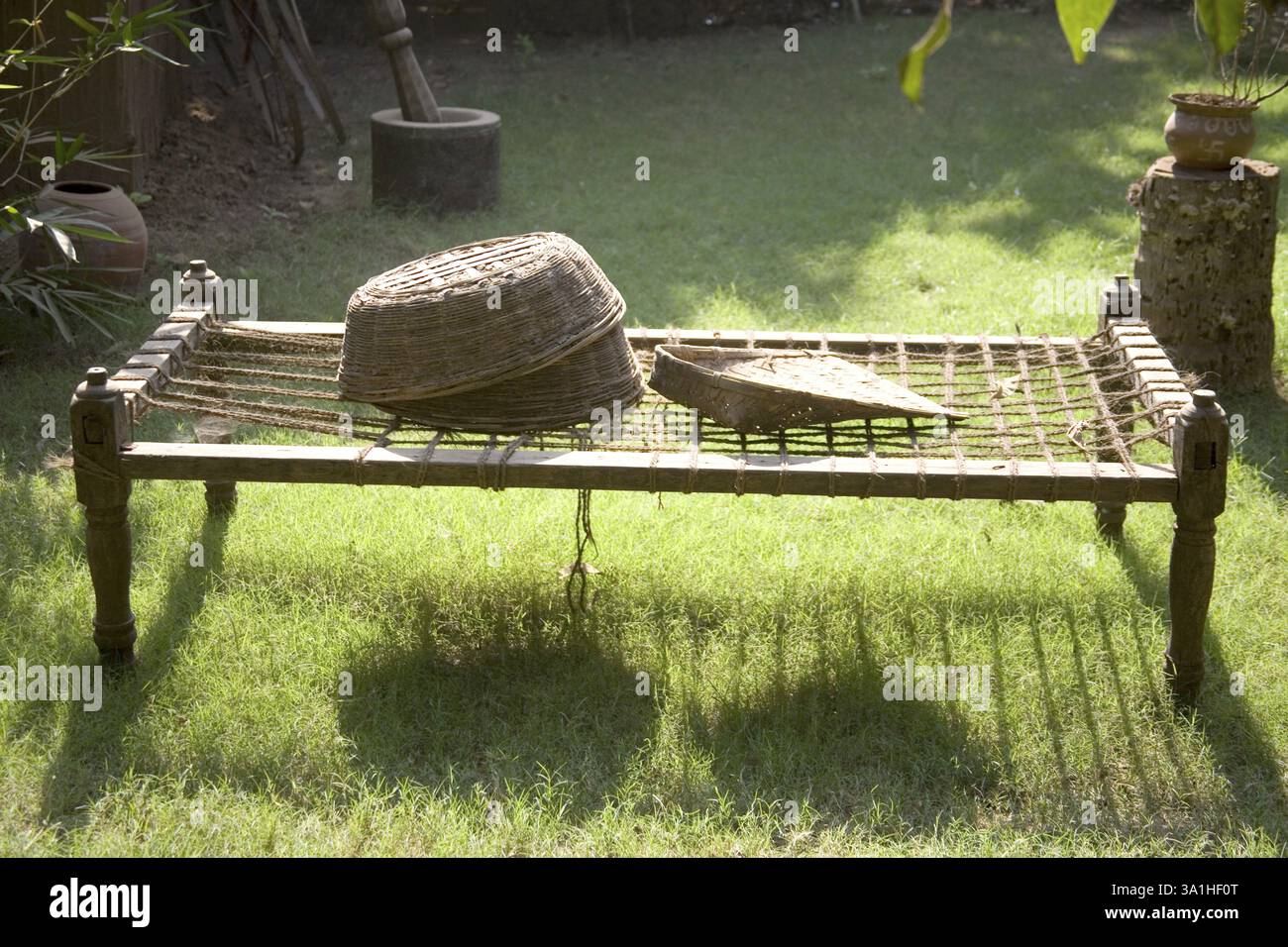 Winnowing basket and buckets on rural cot, installation in Amusement ...