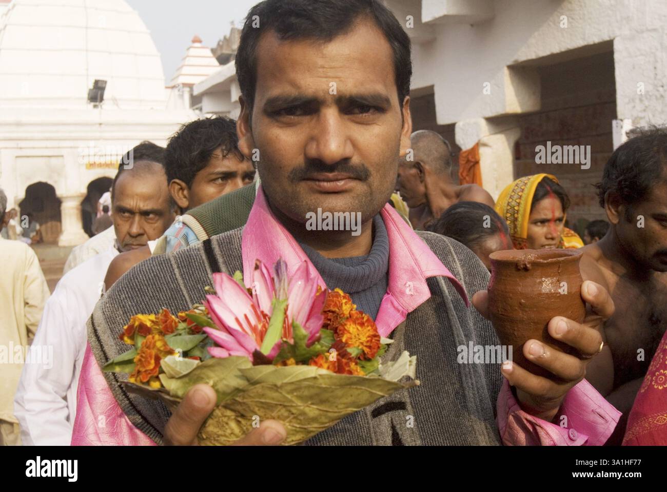 Devotee worshipping at ancient temple of Baba Baidyanath very famous and attract lot of pilgrims ...
