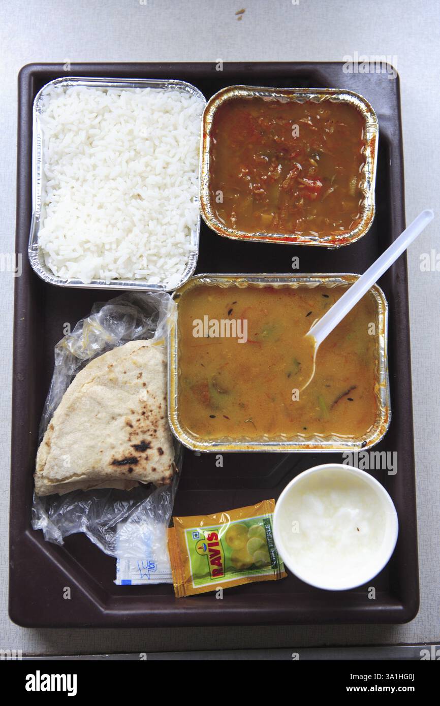 Chapatti Dal Rice Sabzi Pickle Curd salt of lunch served in Train ...