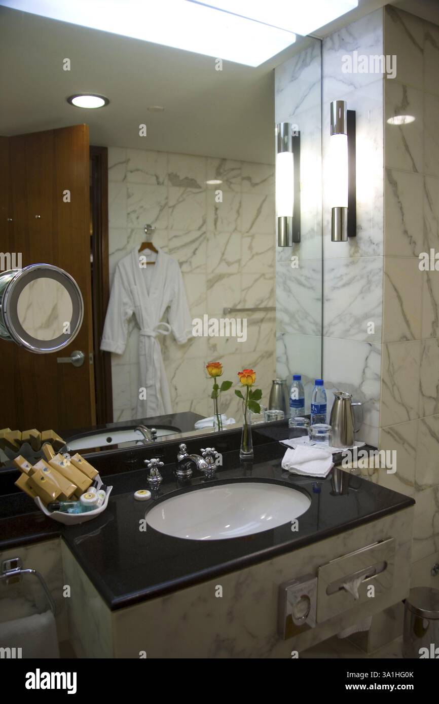 Mirror and wash basin in bathroom, Dubai International Hotel, Dubai ...